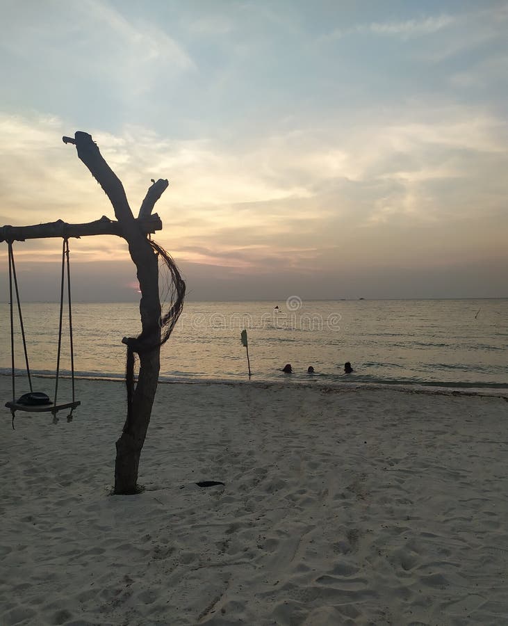 Three People Swimming at the Beach Boundary Stock Image - Image of ...