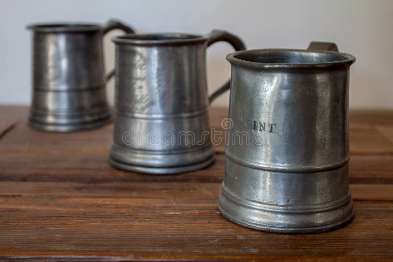 Three pewter bottles stock image. Image of wine, classic - 552397