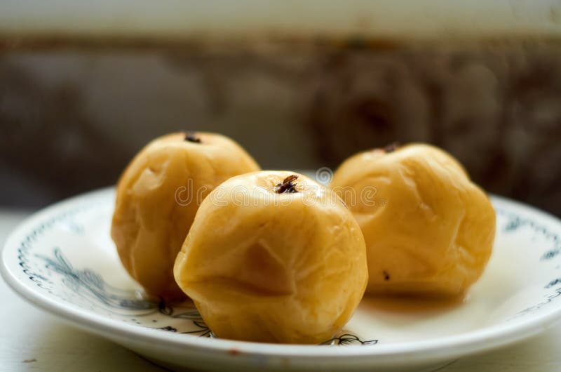 Three Pickled Apples on a Plate Stock Photo - Image of cuisine, sliced ...