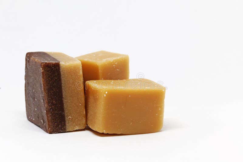 Three Pieces of Caramel with Chocolate and Salt Stock Photo - Image of ...