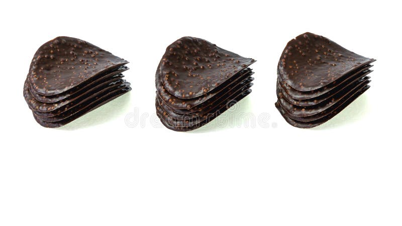 Three Pieces of Dark Chocolate Chips on a White Background Stock Image ...