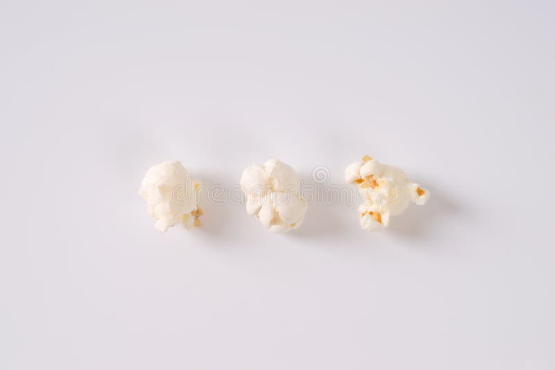 Three Pieces of Fresh Popcorn Stock Photo - Image of popcorn, piece ...