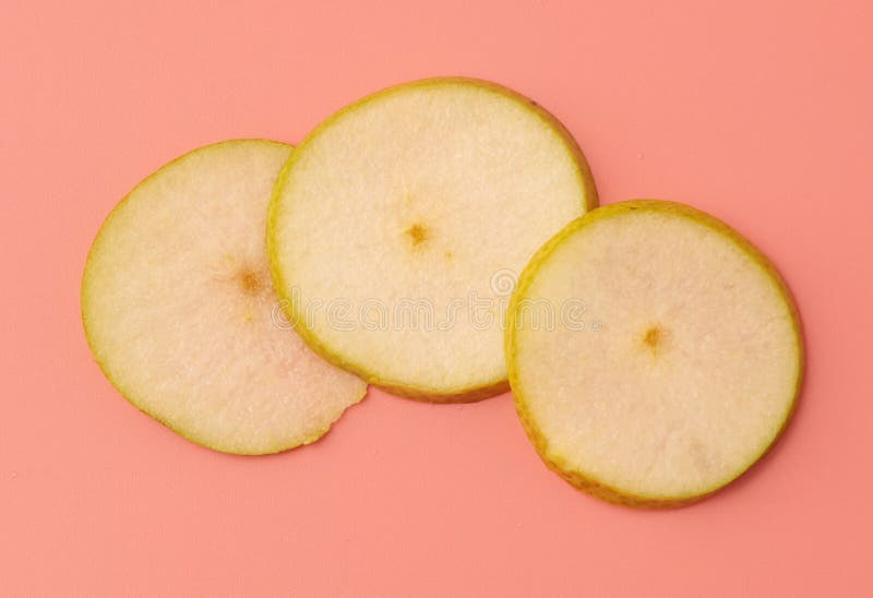 Three Pieces of Pear on a Pink Background Stock Image - Image of ...