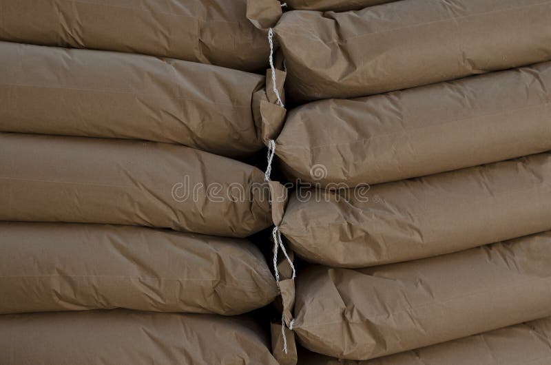 Three piles of big sacks stock image. Image of manufacturing - 115960417
