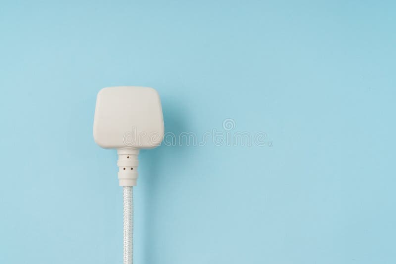 Three Pin Plug on Light Blue Background with a Copy Space Stock Image ...