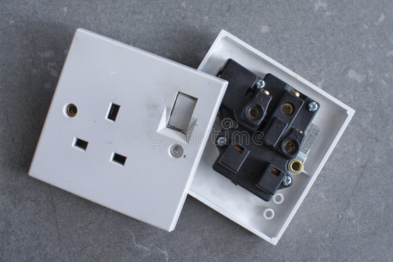 3-pin Plug Socket Adapter Hanging Out from the Wall Stock Image - Image ...