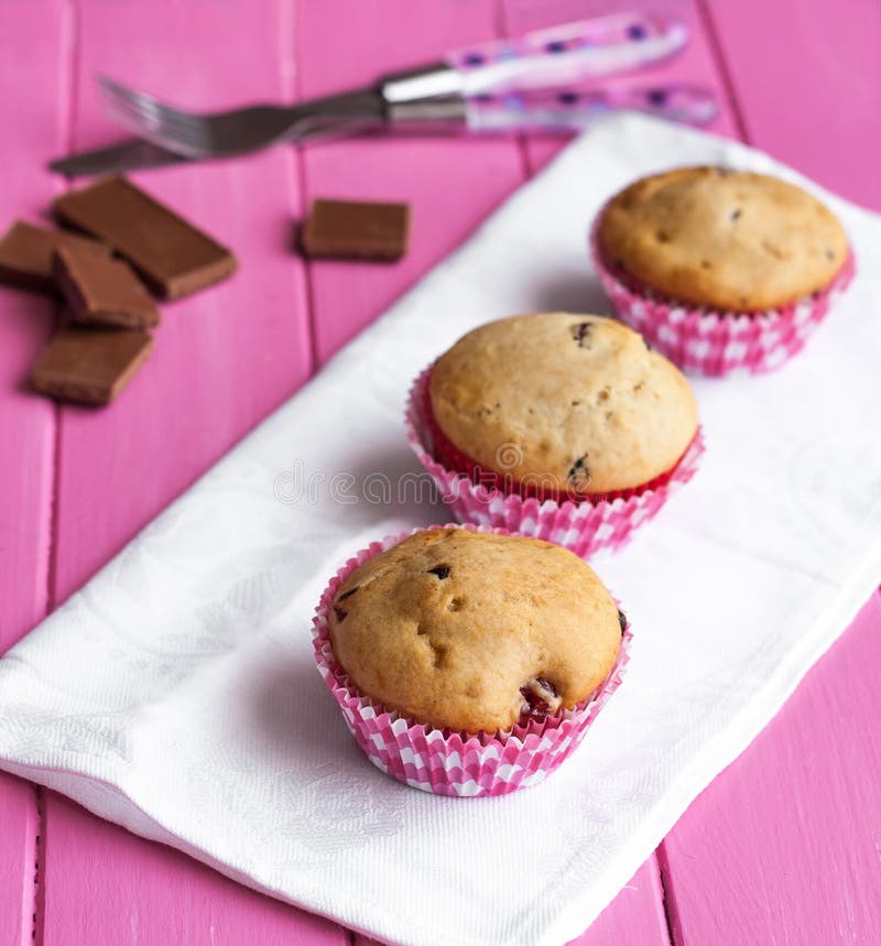 Three pink muffins stock photo. Image of baking, baked - 30222556