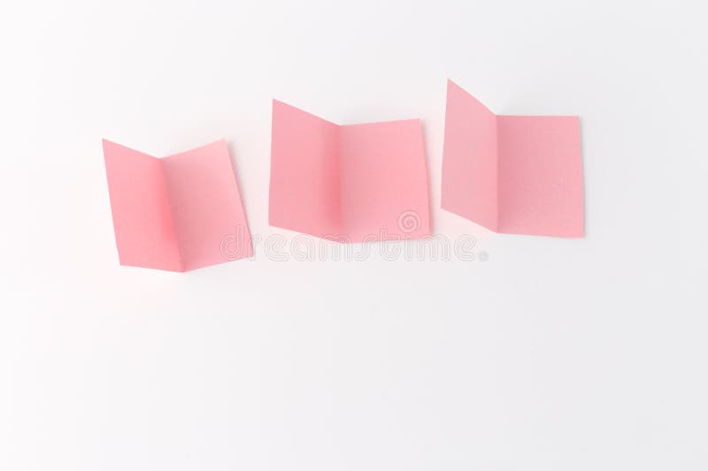 Three Pink Pieces of Paper, Each Folded in Half Vertically. Step in ...