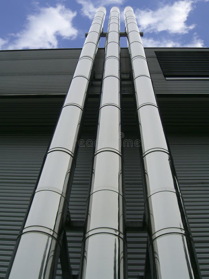 Three Pipes of Red and White Industrial Plant for the Production of ...