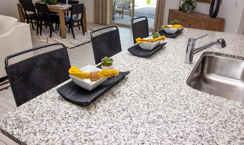 Three Place Settings on Kitchen Counter Island Stock Photo - Image of ...