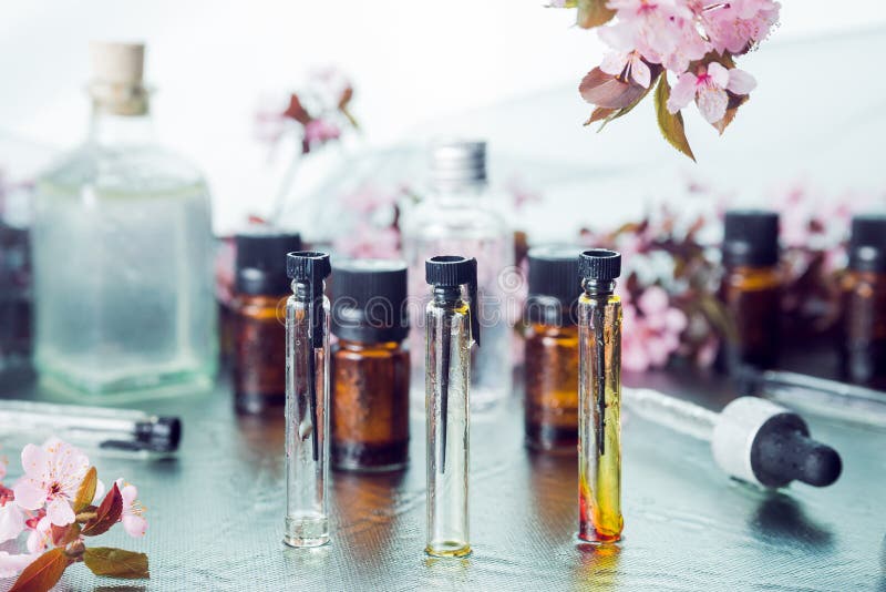 Essential Oils and Herbal Extracts in Aromatherapy and Spa Stock Photo ...