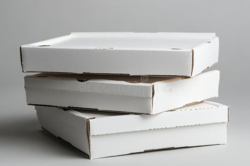 Three Plain White Pizza Boxes Form a Triangular Structure when Stacked ...