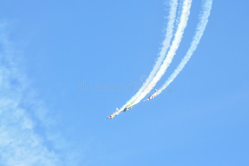 Three Planes Are Flying Leaving A Trail In The Sky Stock Photo - Image ...