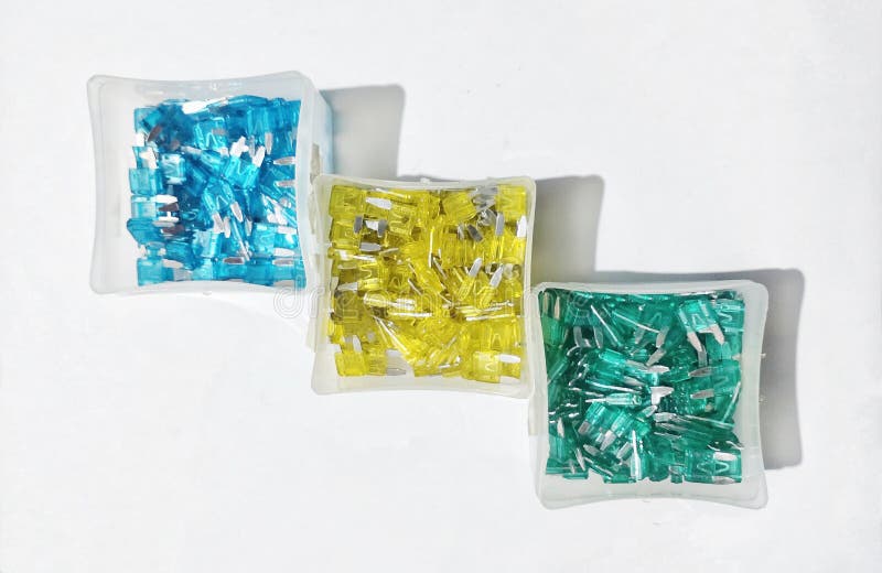 BLUE, YELLOW, GREEN FUSES in the PLASTIC BOX VIEW from ABOVE Stock ...