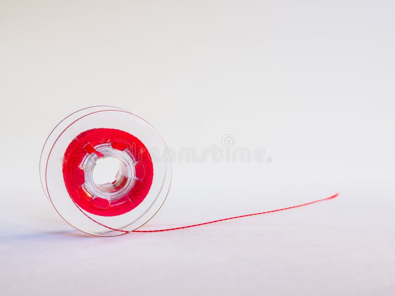 Plastic Spool of Threads for Sewing Machine on a White Background Stock ...