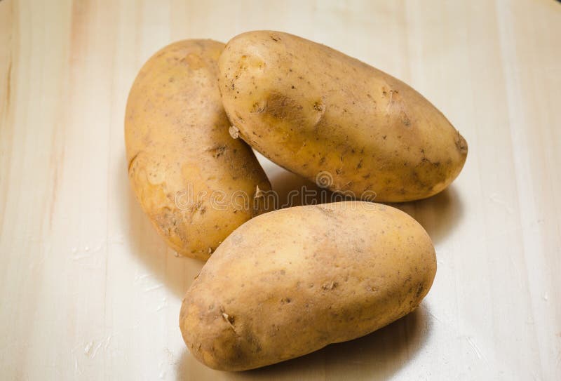 Three potatoes stock photo. Image of vegetables, healthy - 27656416