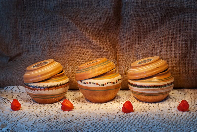 Three pots stock image. Image of brown, wood, sacking - 27677161