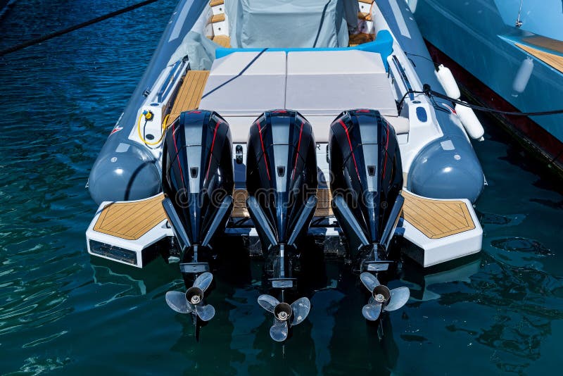 Three Powerful Outboard Motors Stock Photo - Image of drive, island ...