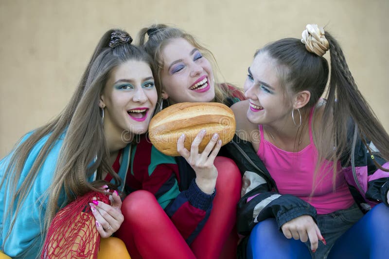 Three Pretty Girls Dressed in the Style of the Nineties Stock Photo ...