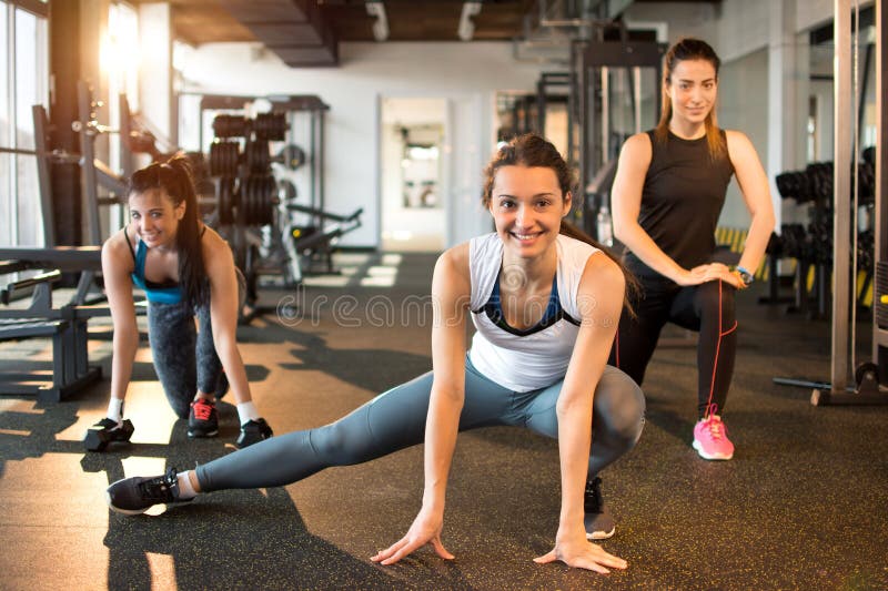 Three Pretty Girls Workout in the Gym Stock Photo - Image of ...