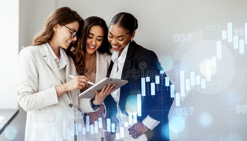 Three Professional Women Engaging in a Collaborative Discussion Over a ...
