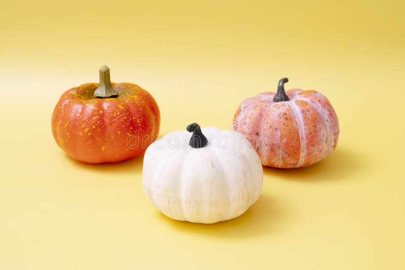 Three Pumpkins on Warm Background. Template for Autumn and Halloween ...