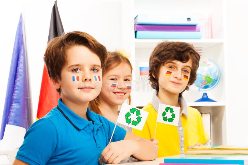 Three Pupils Sitting in Class at Ecology Lesson Stock Image - Image of ...