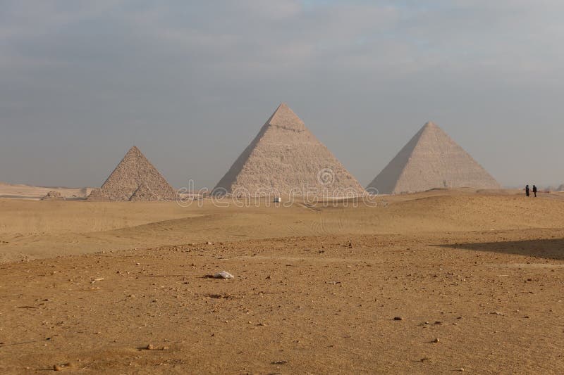 The Pyramids of Egypt Side by Side in the Middle of Desert Sand with ...