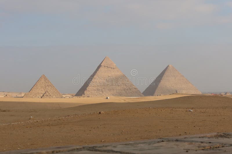 The Pyramids of Egypt Side by Side in the Middle of Desert Sand with ...