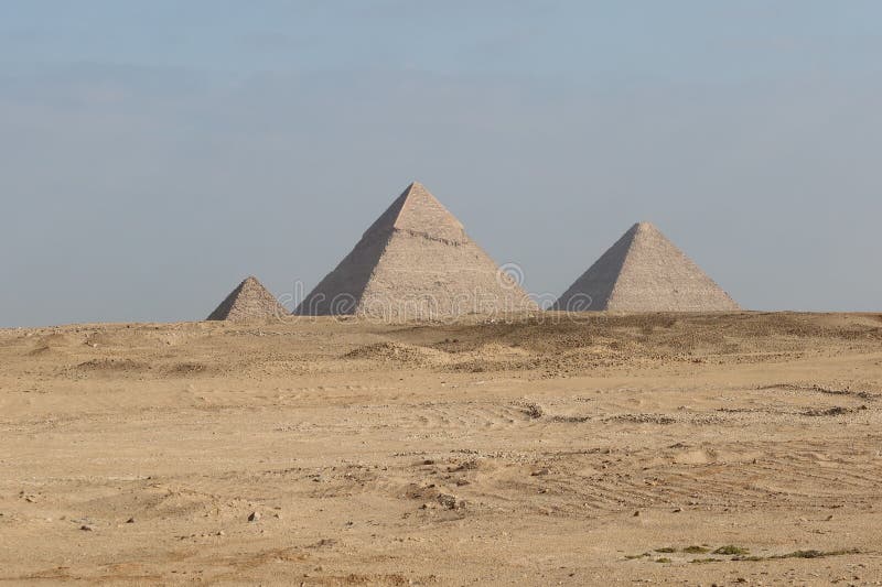 The Pyramids of Egypt Side by Side in the Middle of Desert Sand with ...