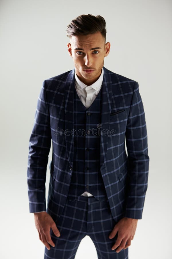 Three Quarter Length Front View of Young Man Wearing Suit Stock Image ...