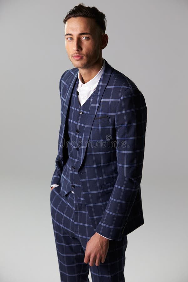 Three Quarter Length Portrait of Young Man Wearing Suit Stock Photo ...