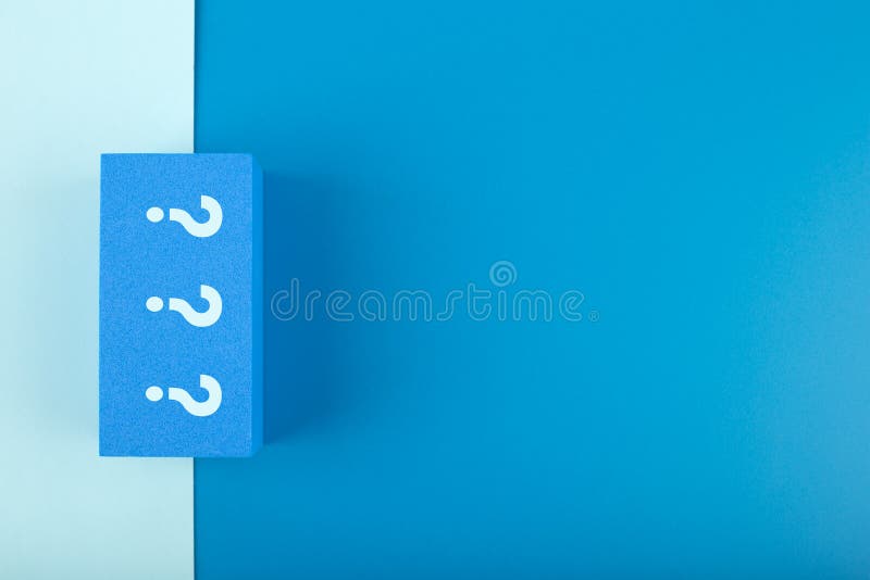 Three Question Marks on Blue Rectangle on Monochromatic Blue Background ...