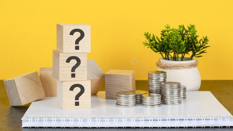 Three Question Marks on Wooden Blocks Stack, Yellow Background Stock ...