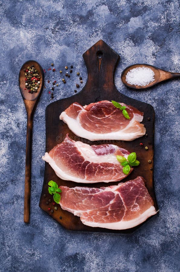Three raw pieces of meat stock photo. Image of condiments - 113932482