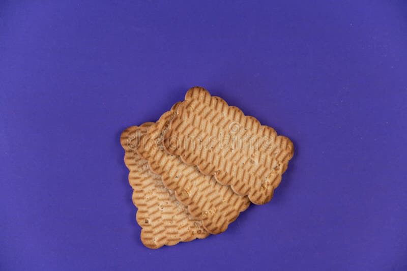 Three Rectangular Cookies Against a Blue Background. Ready-to-eat ...