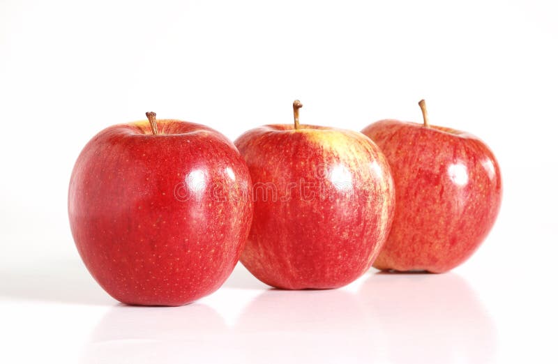 Three red apples stock image. Image of droplets, seed - 2398545