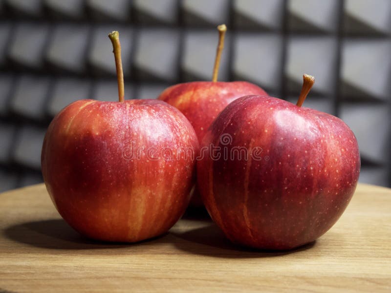 Three Red Apples on a Wooden Surface. Gala Variety Apples Stock Image ...