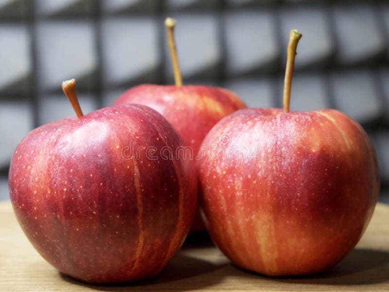 Three Red Apples on a Wooden Surface. Gala Variety Apples Stock Image ...