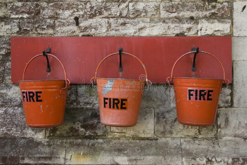 Fire Buckets Hanging on Wall Stock Image - Image of pegs, hooks: 179910779
