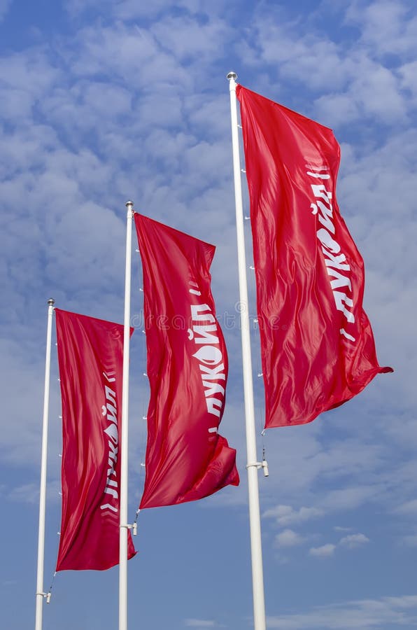 Three Red Flag Against the Backdrop of a Cloudy Sky Editorial Image ...