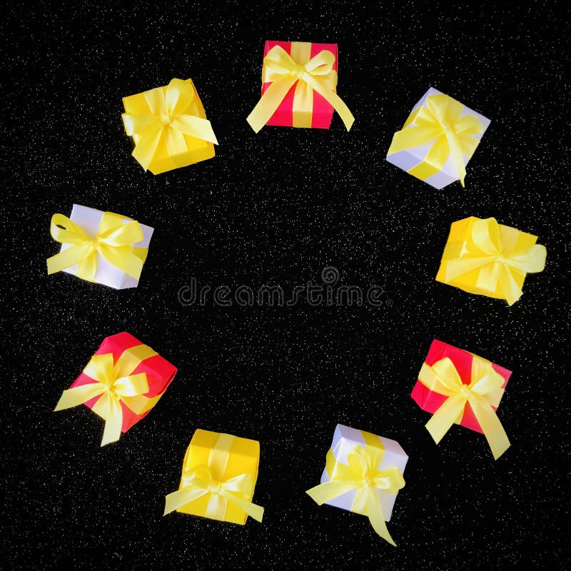 Nine Colorful Gift Boxes Arrangement into a Circle Shape on Black ...