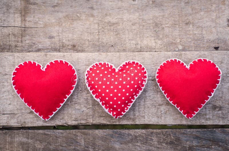 Three Red Heart Shape on a Wooden Table Stock Image - Image of marriage ...