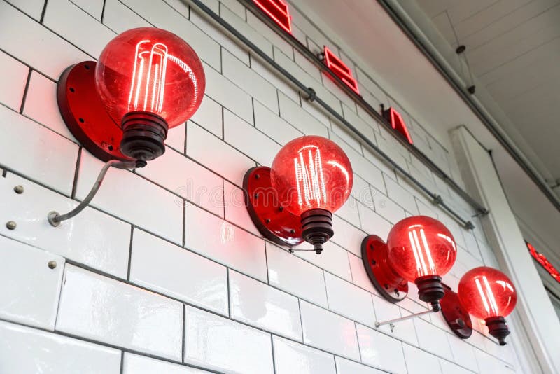 Three Red Neon Bulbs on White Wall Stock Illustration - Illustration of ...