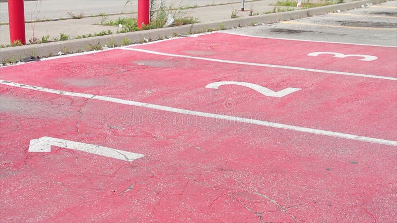 Three Red Parking Spots Spaces with Numbers 1 2 3 in Each of Them Side ...