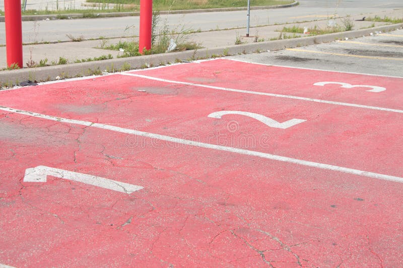 Three Red Parking Spots Spaces with Numbers 1 2 3 in Each of Them Side ...