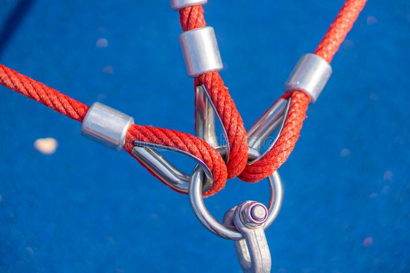 Three red ropes on ring stock image. Image of rope, ring - 149359143