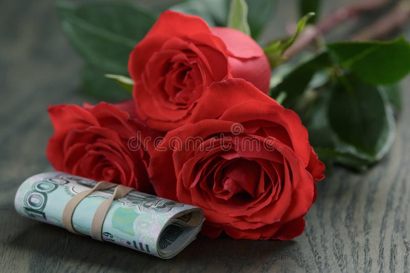 Three Red Roses and Bunch of Russian Money Stock Photo - Image of gift ...