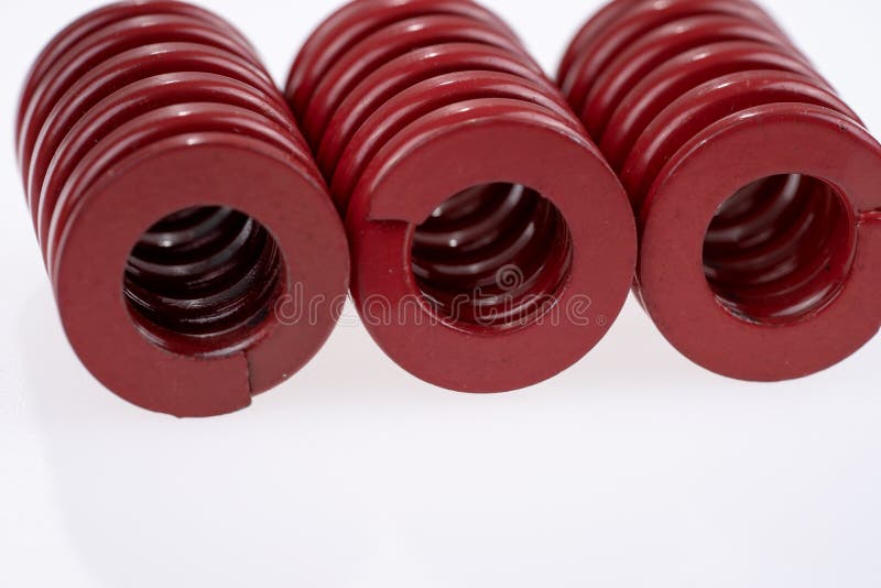 Three Red Strong Metal Springs Isolated on a White Stock Photo - Image ...