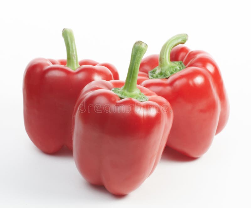 Three Red sweet peppers stock photo. Image of freshness - 13974598